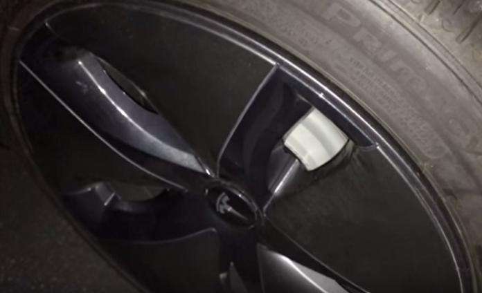 Removing and Attaching The Aero Wheel Covers on Tesla Model 3 | Torque News